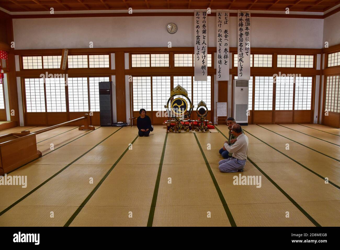 Japanese girl and men are waiting ceremony at the Tenrikyo church in ...