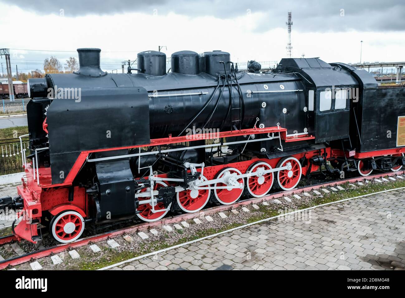 Old Russian locomotive. Steam locomotive with red wheels. Retro ...