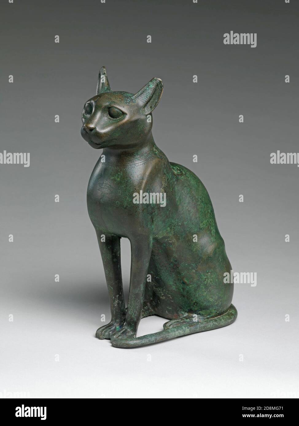 A bronze statue of a cat representing the goddess Bastet in The Met ...