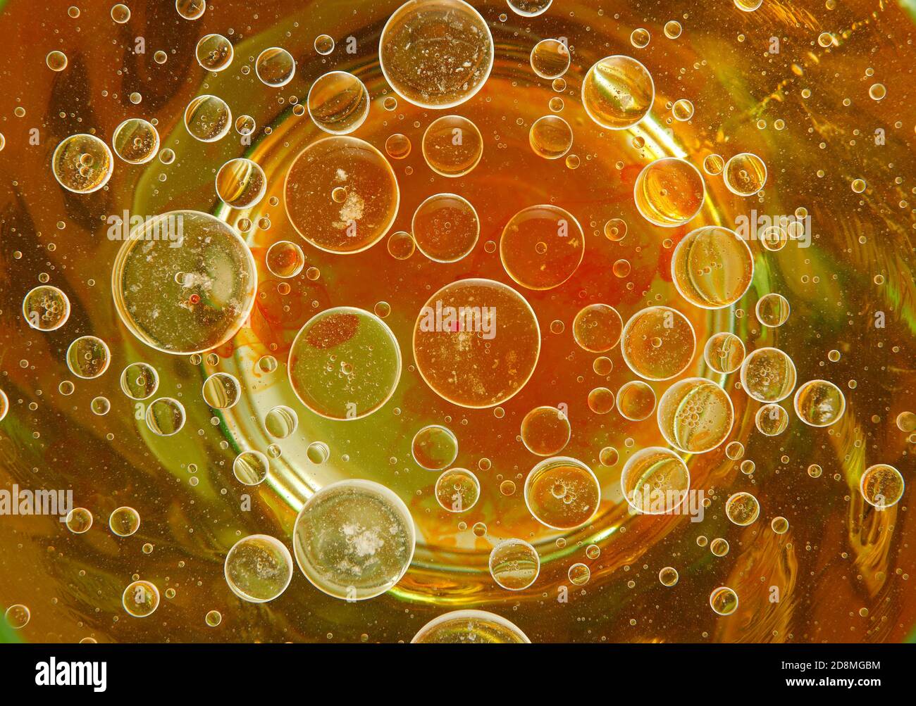 oil floating on colour water-special effect Stock Photo - Alamy