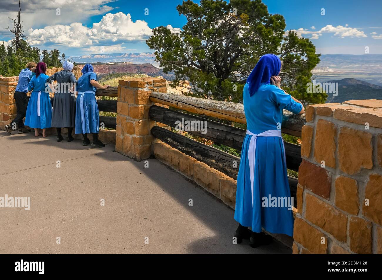 Amish women overlooking Bruce Canyon USA Stock Photo - Alamy