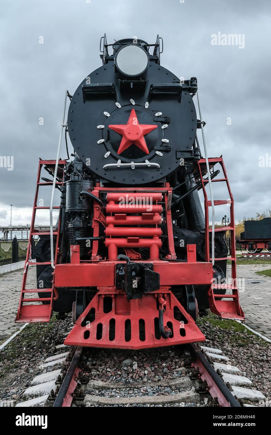 Old Russian locomotive. Steam locomotive with red wheels. Retro ...