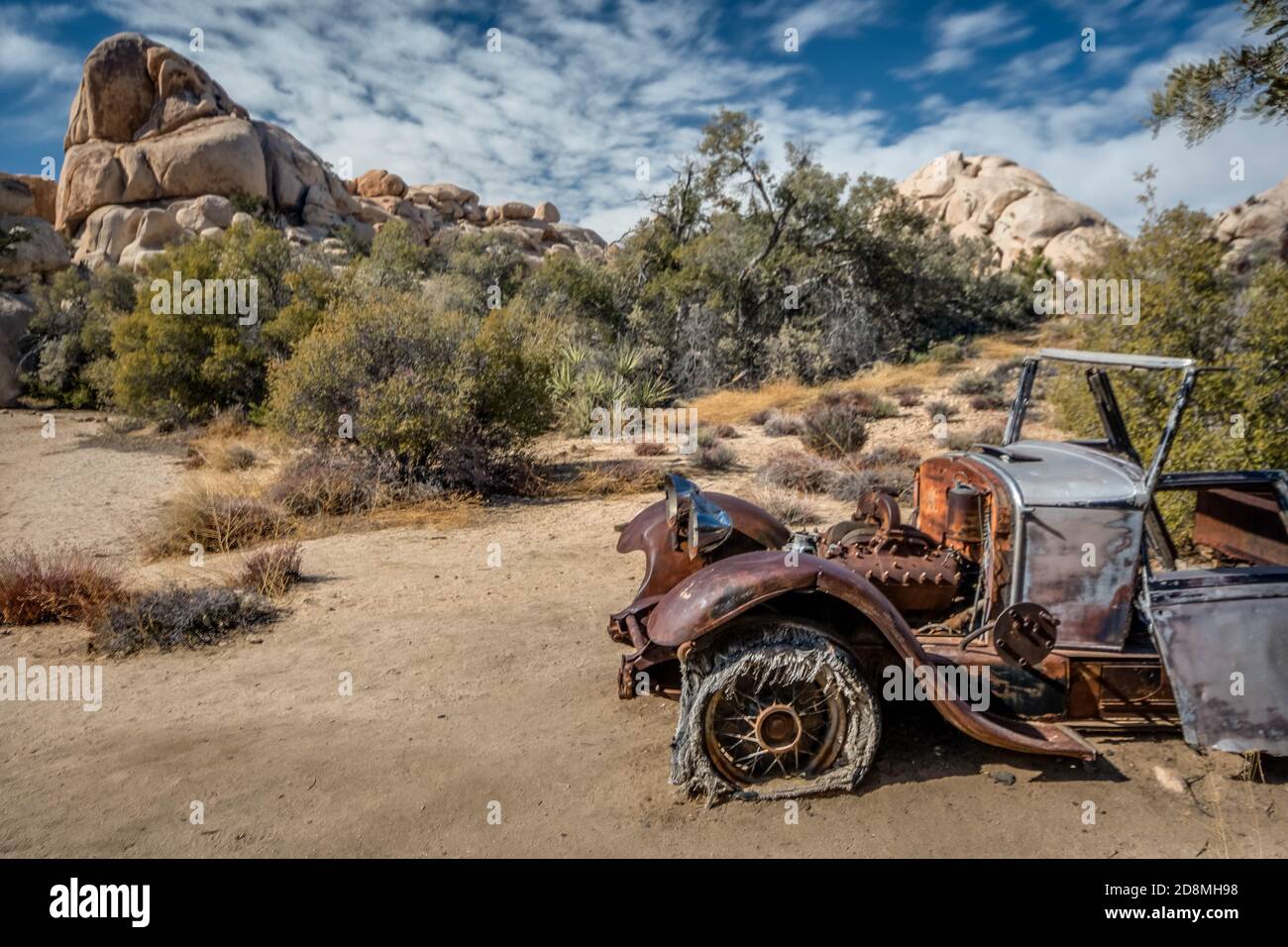 Old wrecked jalopy car in Joshua Tree near Wall Street Mine Stock Photo ...