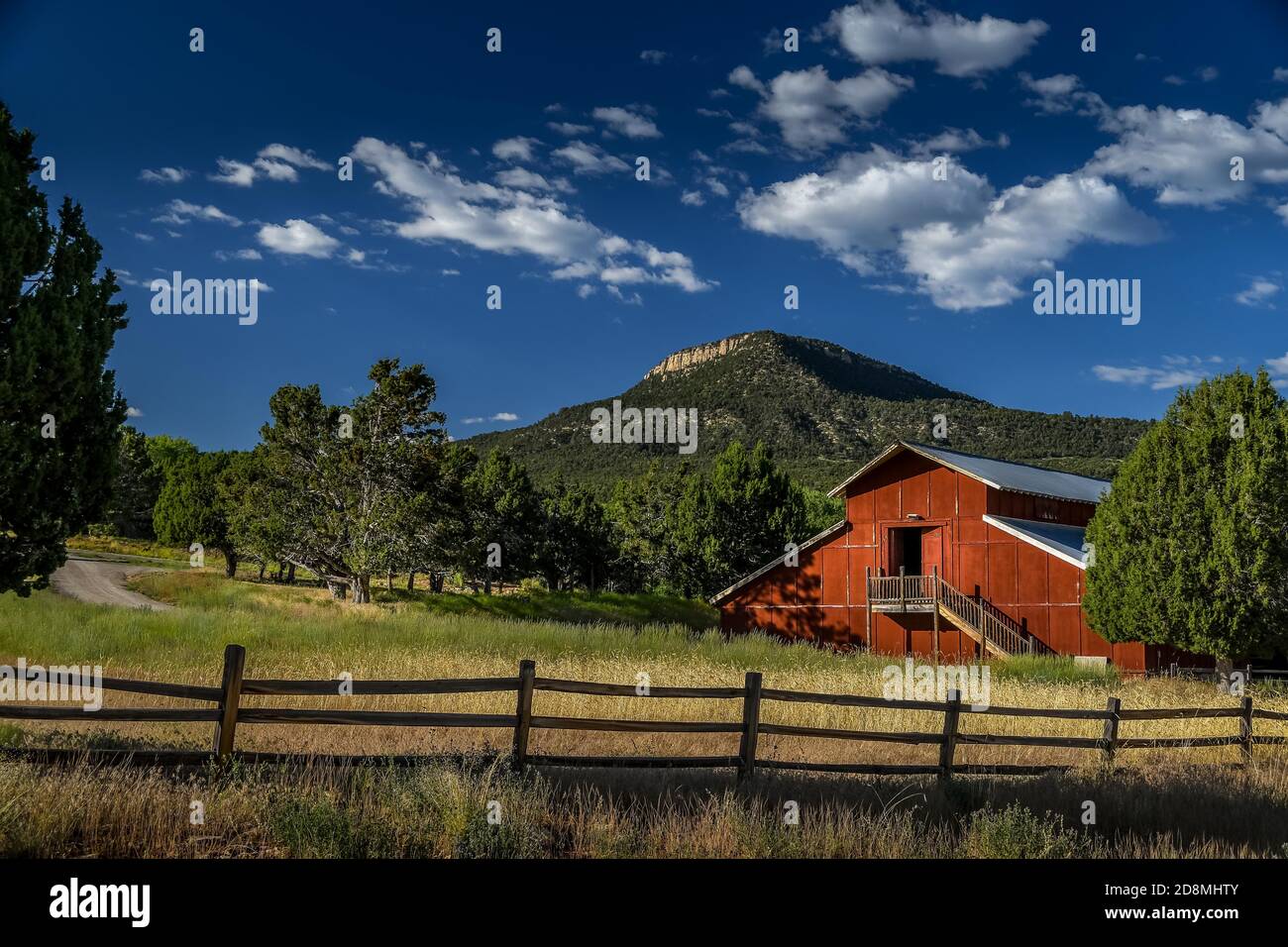Red barn in Utah in corn field with wooden fence Stock Photo - Alamy