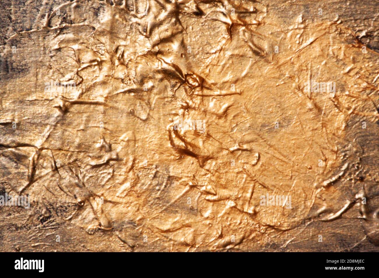 Gold is a bright shiny texture of dried paint Stock Photo - Alamy