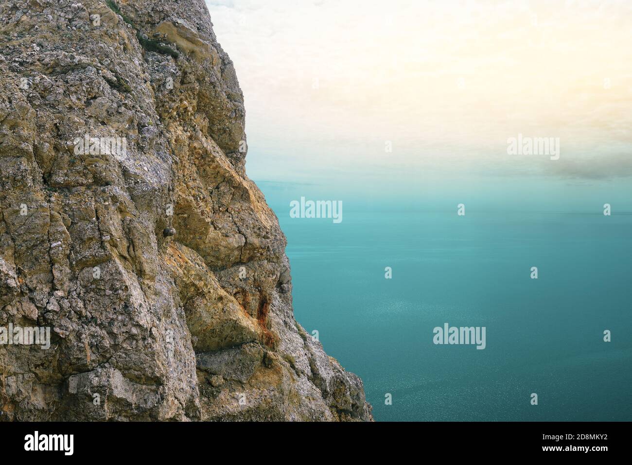 Big rock and seascape. Skyline with sunlight. Dramatic scene and beauty ...