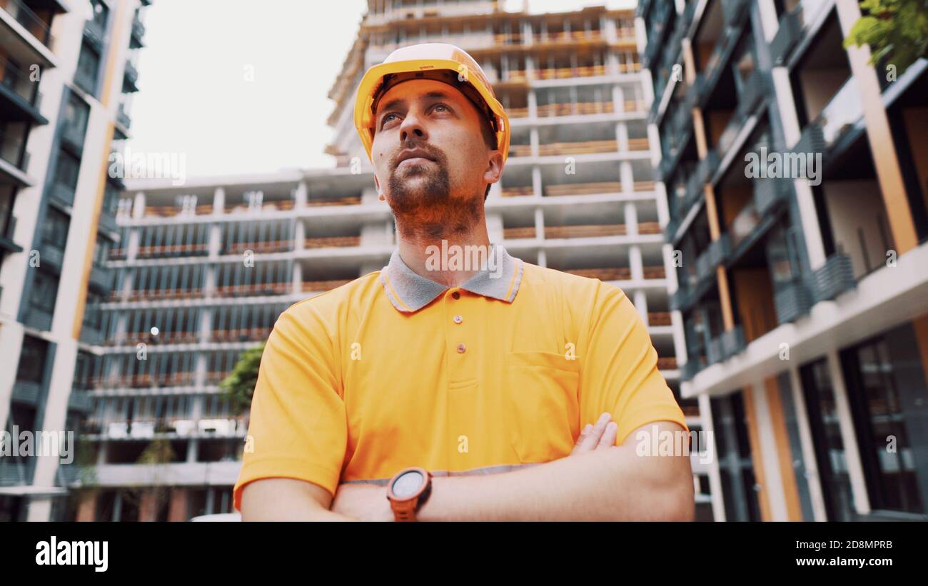 Builder portrait with proud expression. Successful constructor or ...