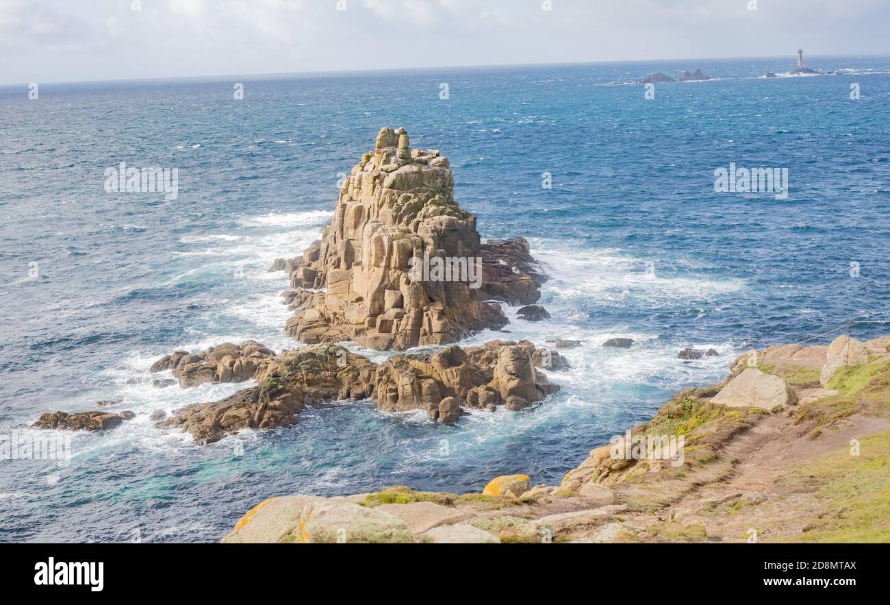 Outcrop of rocks off coast near lands end in Cornwall Stock Photo - Alamy