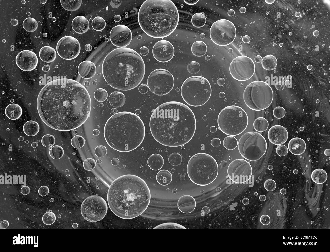 Floating oil patterns hi-res stock photography and images - Alamy