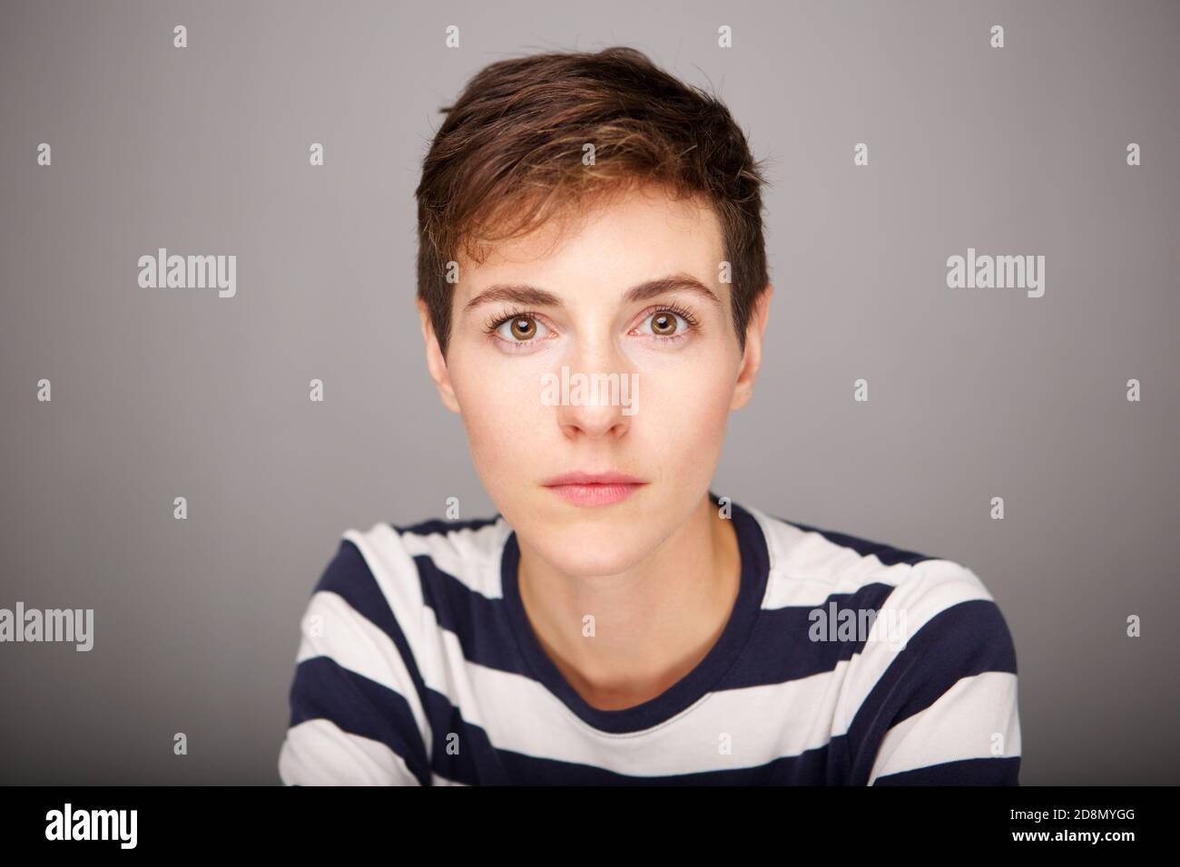 Close up portrait of serious young woman with short hair staring Stock ...