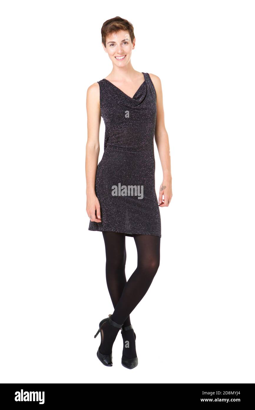 Full body portrait of beautiful young woman with short hair in black ...