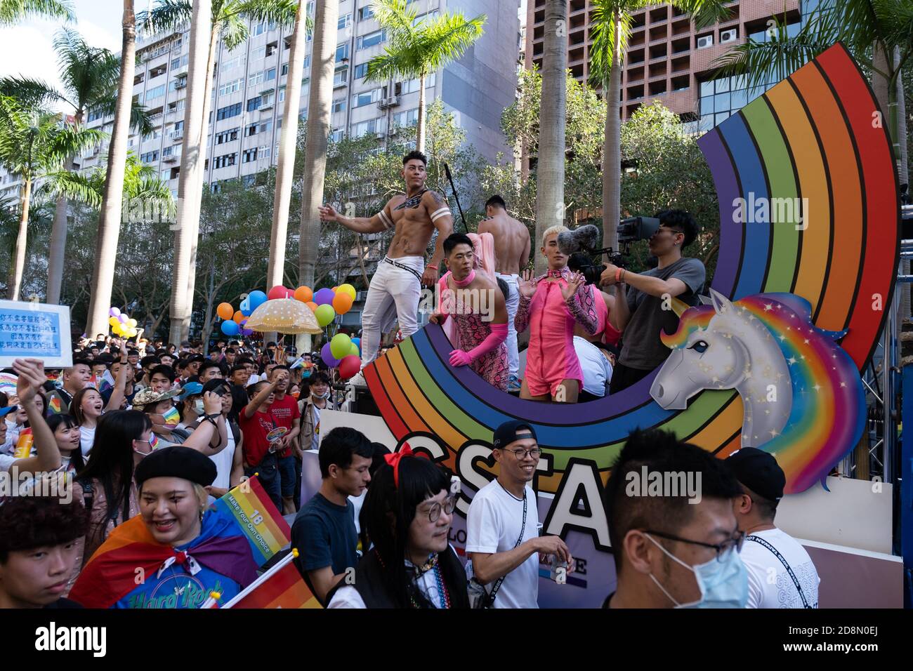People seen dancing on a rainbow decorated vehicle during the 2020 ...