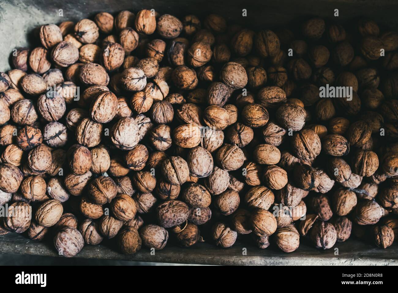Large group of wallnut fruit background Stock Photo - Alamy