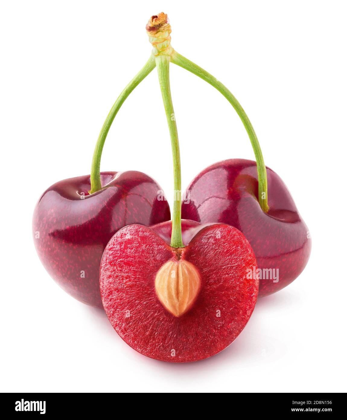 Isolated cherries. Three cherries on a stem, one cut in half with ...