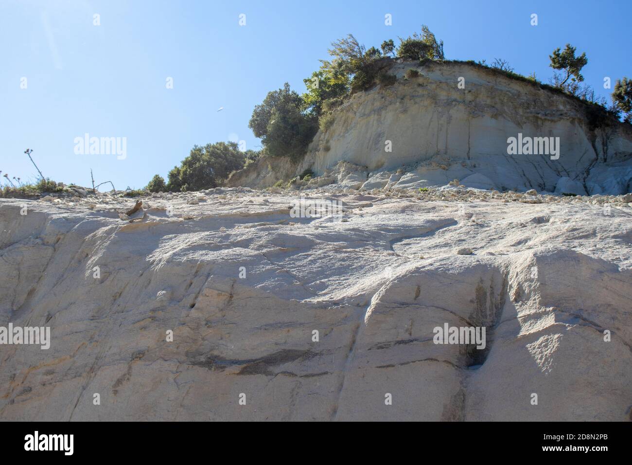 sand dune with sky behind and trees Stock Photo - Alamy
