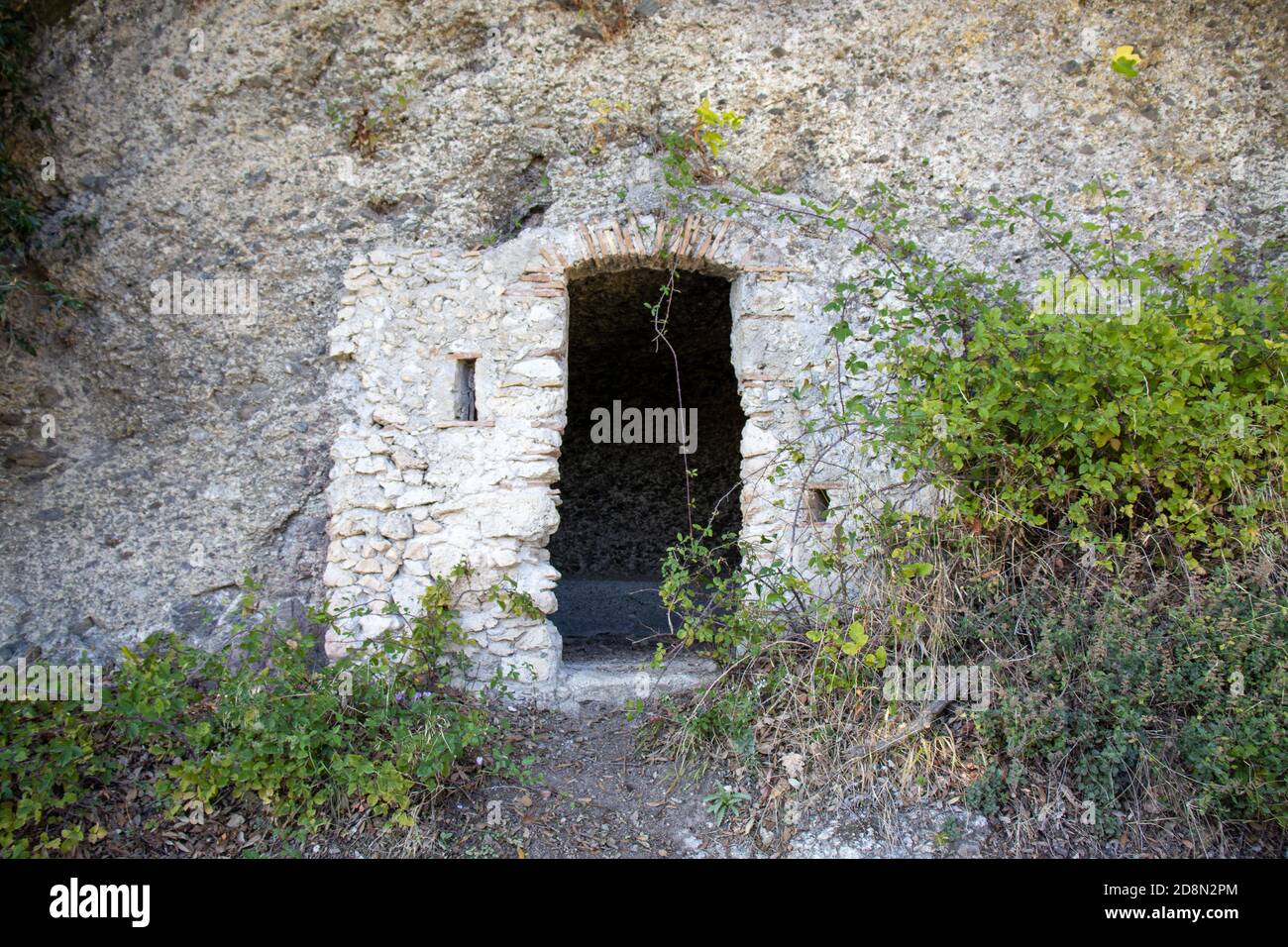 stone house carved into the white rock Stock Photo - Alamy