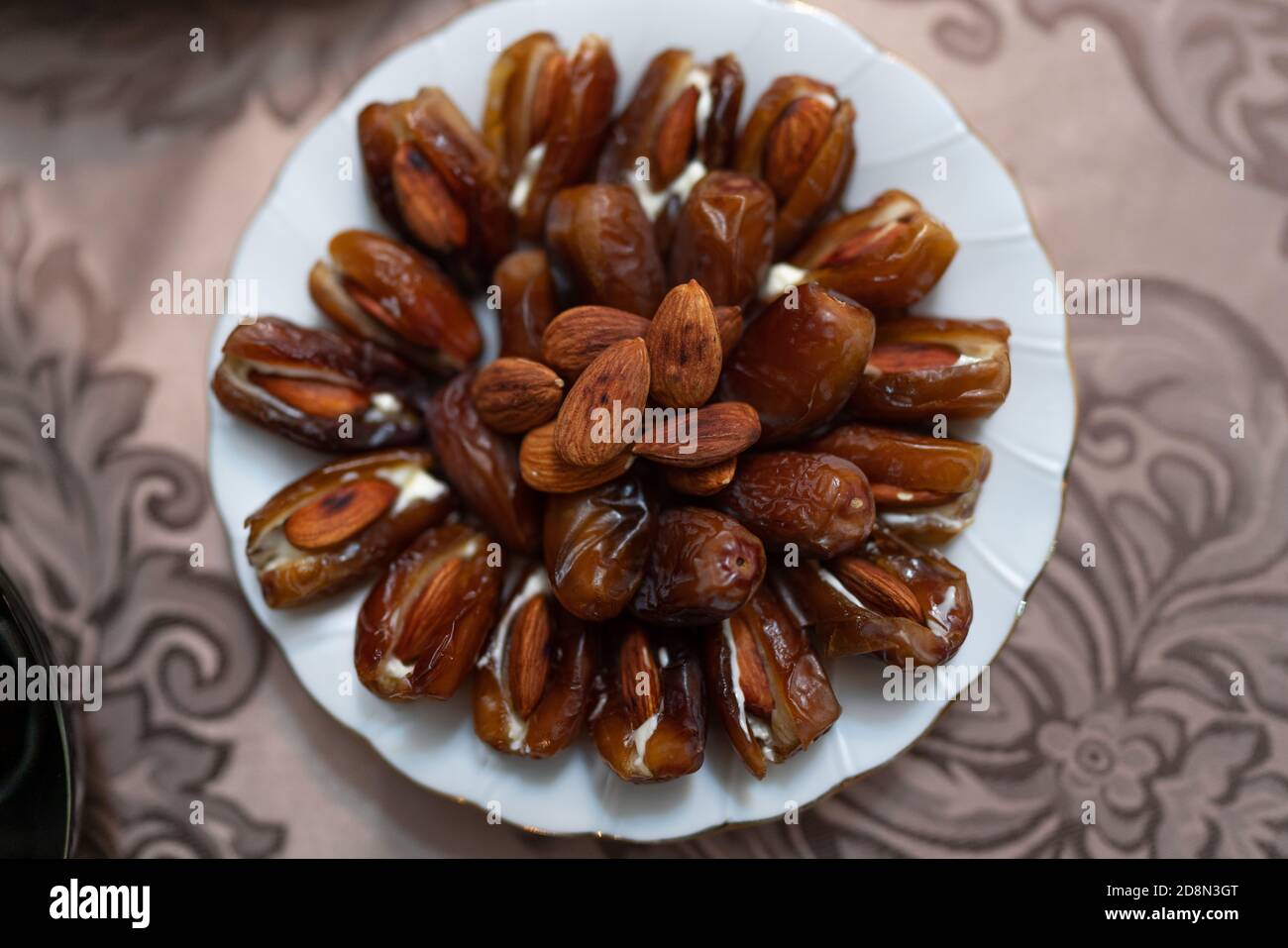 Homemade dates with almonds and butter | super healthy foods Stock ...