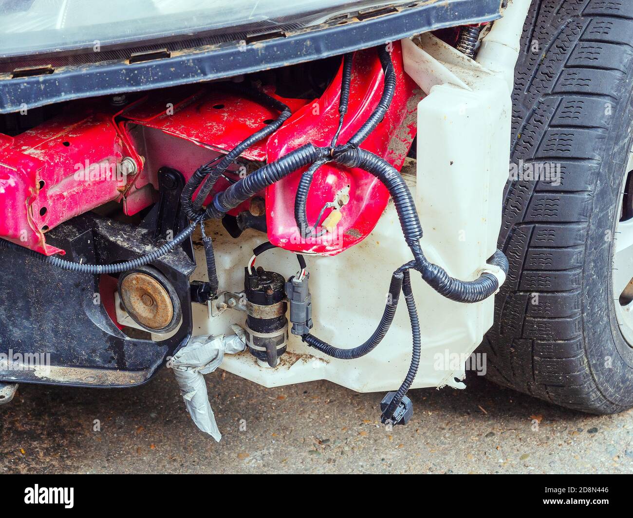 Fragment of a car with a broken front. Close-up photo Stock Photo - Alamy