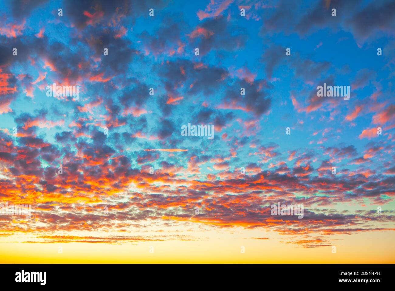 Spectacular blue sky with cumulus clouds and sun rays hi-res stock ...