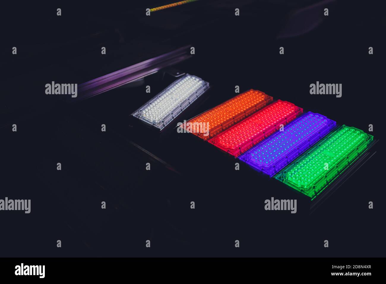 LED strip in purple colors and a control panel for switching colors ...