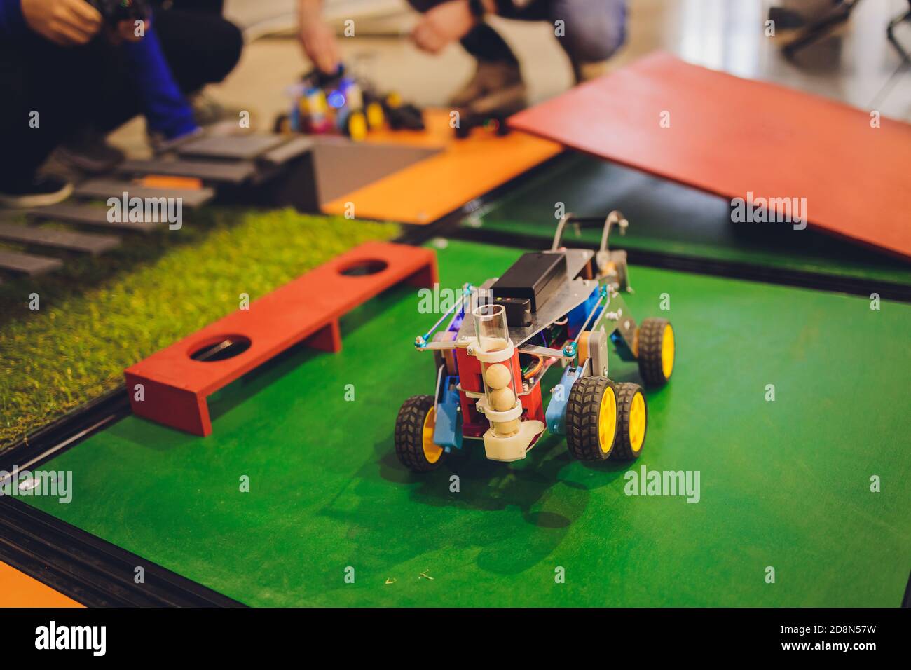 Homemade robot on wheels with eyes. Hobby robotics Stock Photo - Alamy