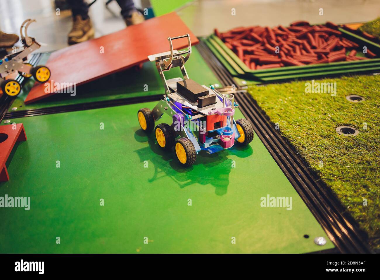 Homemade robot on wheels with eyes. Hobby robotics Stock Photo - Alamy
