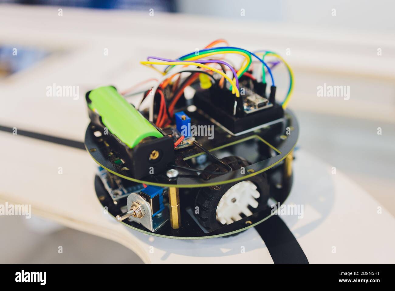 Homemade robot on wheels with eyes. Hobby robotics Stock Photo - Alamy
