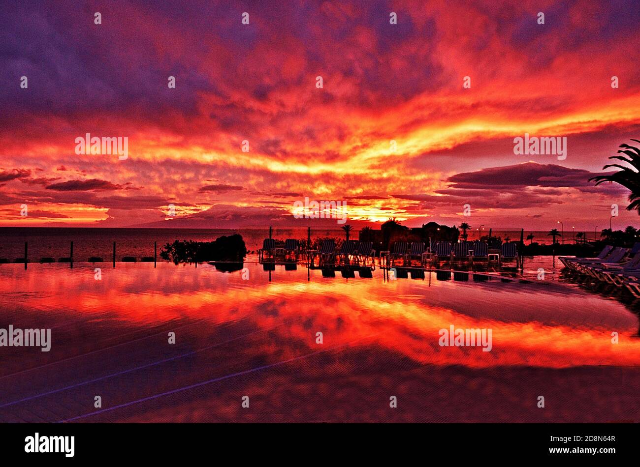 pool resort sunset golden hour Stock Photo - Alamy