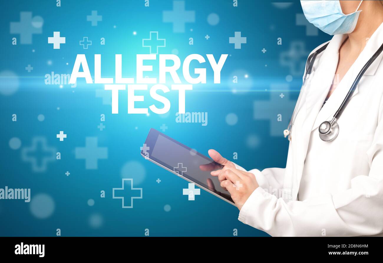 doctor writes notes on the clipboard with ALLERGY TEST inscription ...