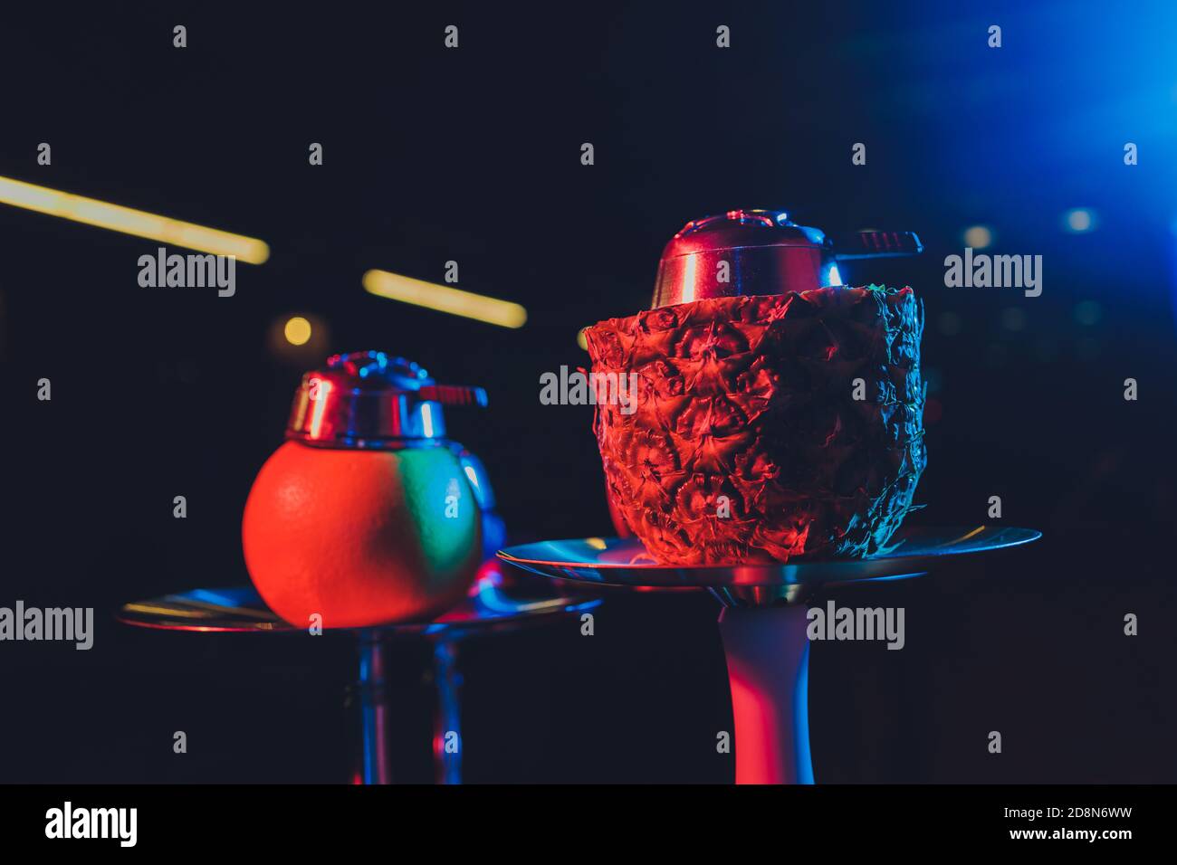 Red shisha hookah with smoke and red sparks on wood table brick, art ...