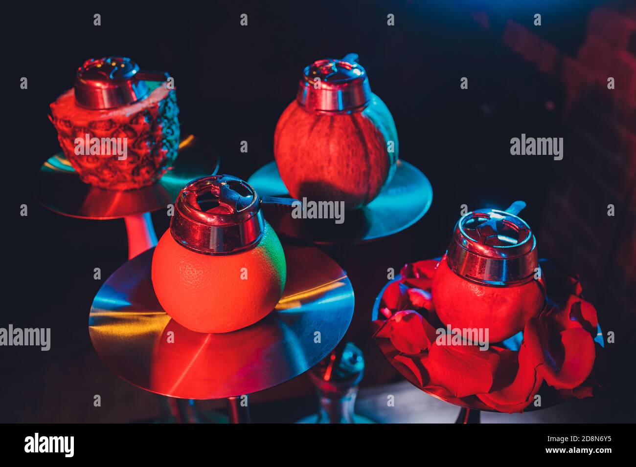 Red shisha hookah with smoke and red sparks on wood table brick, art ...
