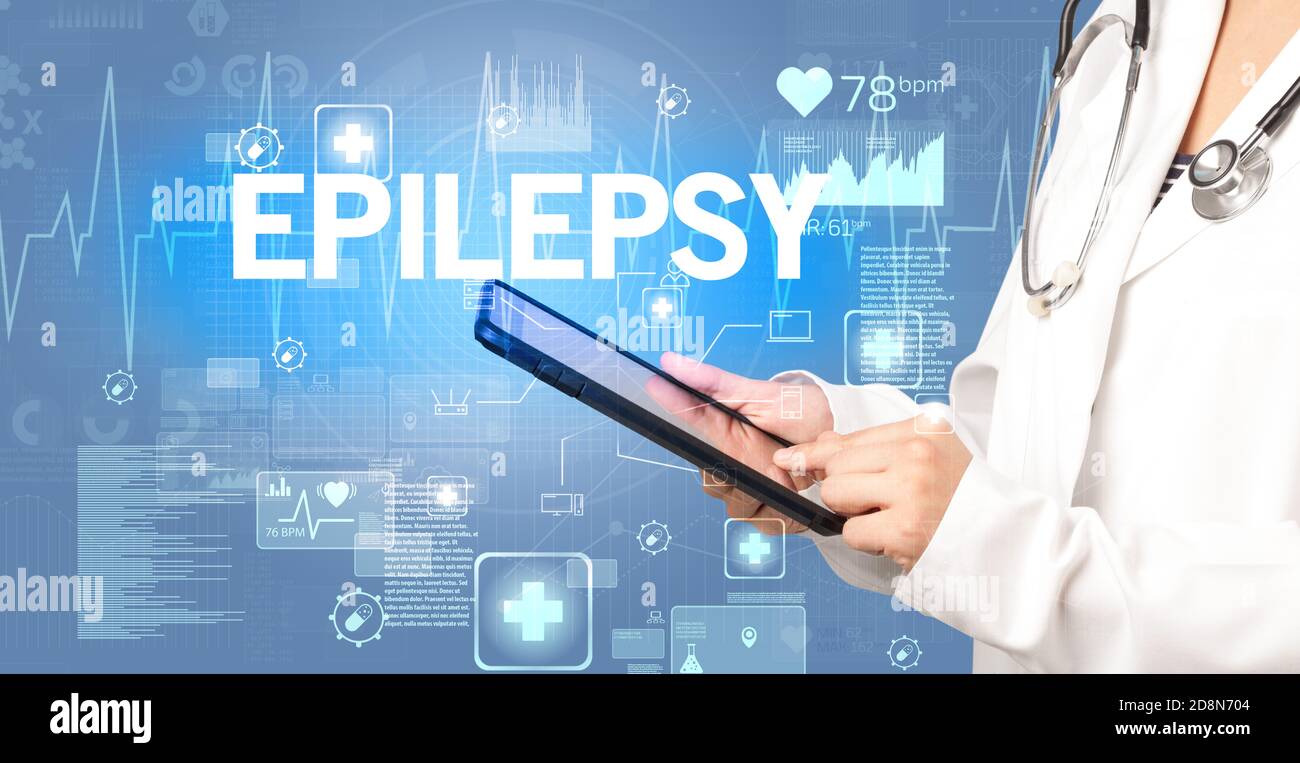 young doctor writing down notes with EPILEPSY inscription, healthcare ...