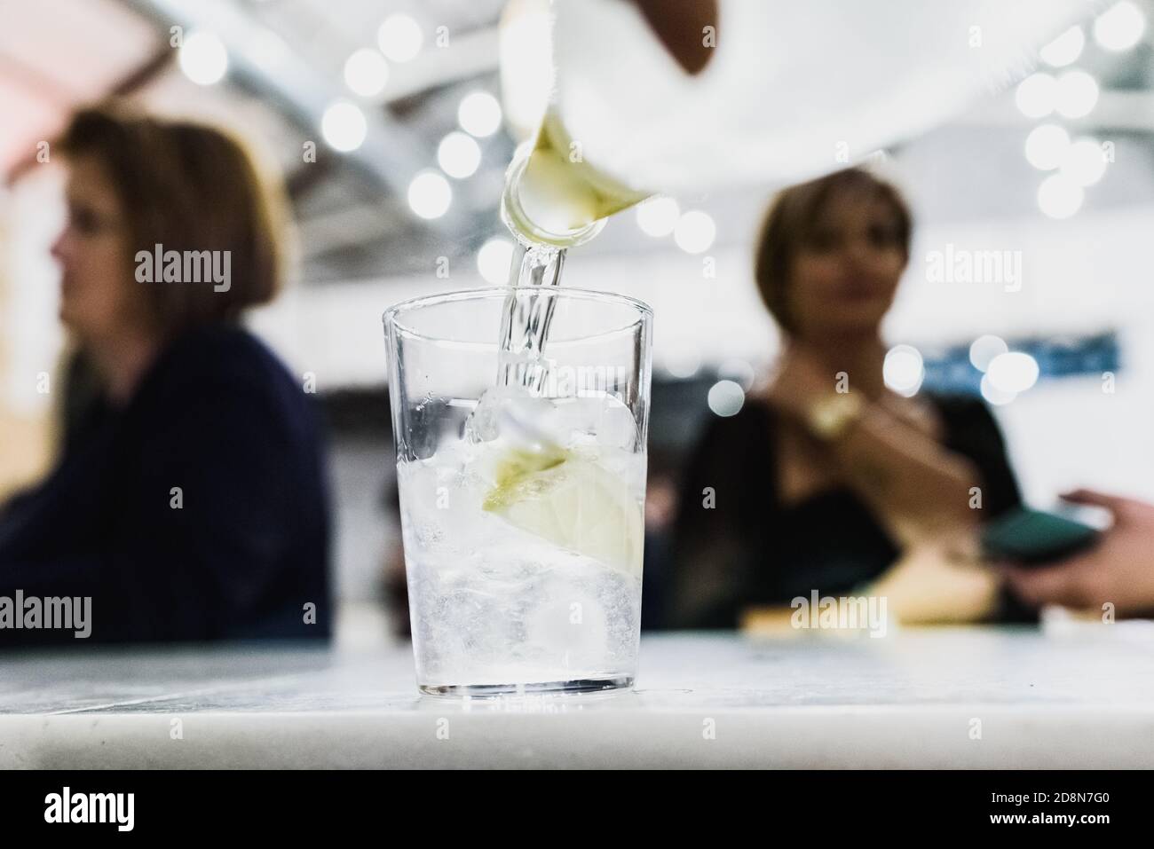 Liquor glasses ready to be prepared in a bar Stock Photo - Alamy