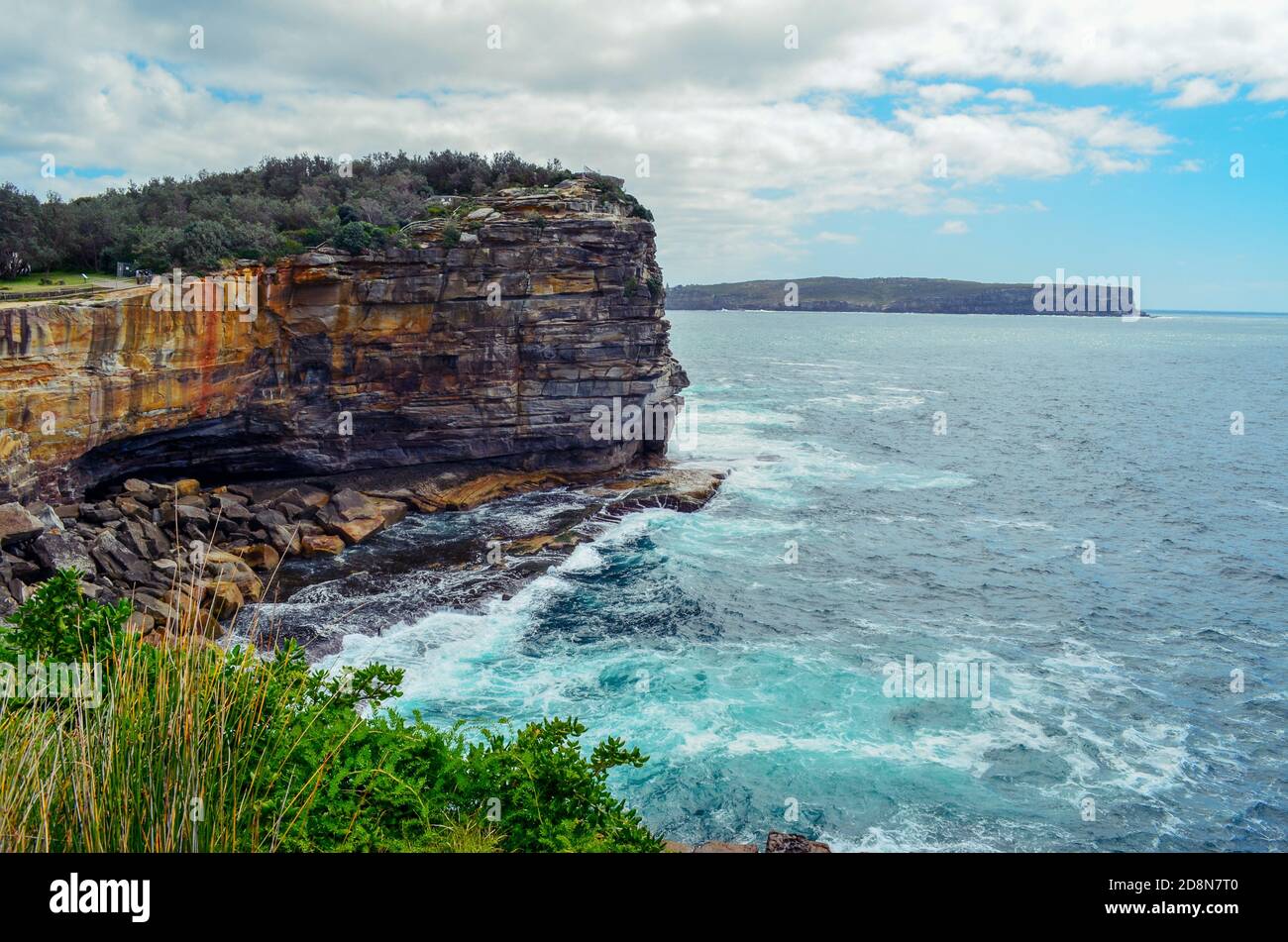 Jagged Rocky Cliffs facing the Sea Stock Photo - Alamy