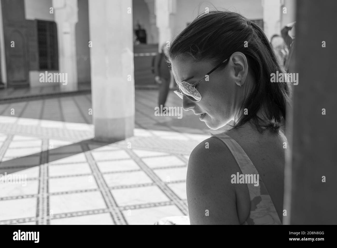 Female looking down thoughtfully. With space for copy Stock Photo - Alamy