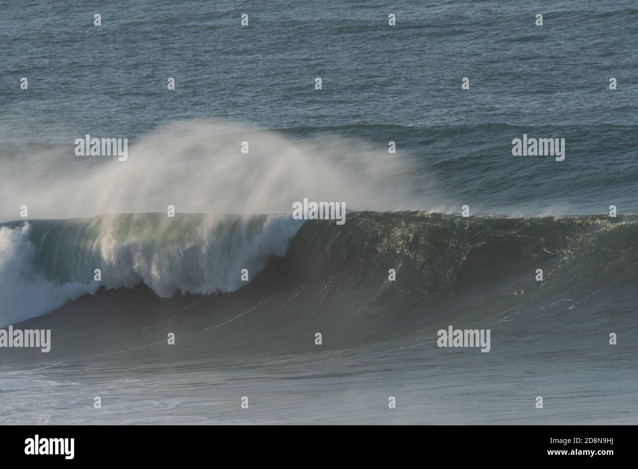 Detail view of large waves breaking in the open ocean during a tropical ...