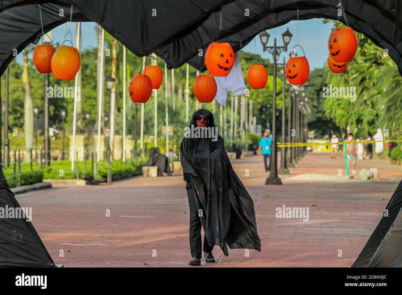 Manila. 31st Oct, 2020. A man dressed as a zombie is seen during a ...