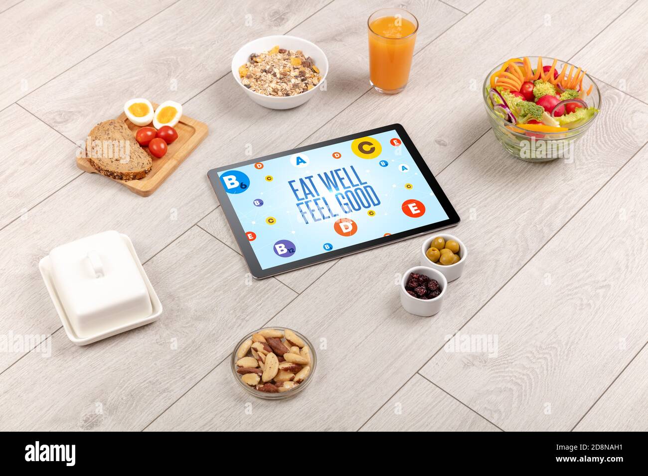 Healthy Tablet Pc compostion with EAT WELL FEEL GOOD inscription ...