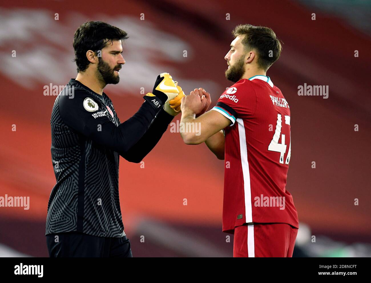 Liverpool's Nathaniel Phillips (right) and goalkeeper Alisson before ...