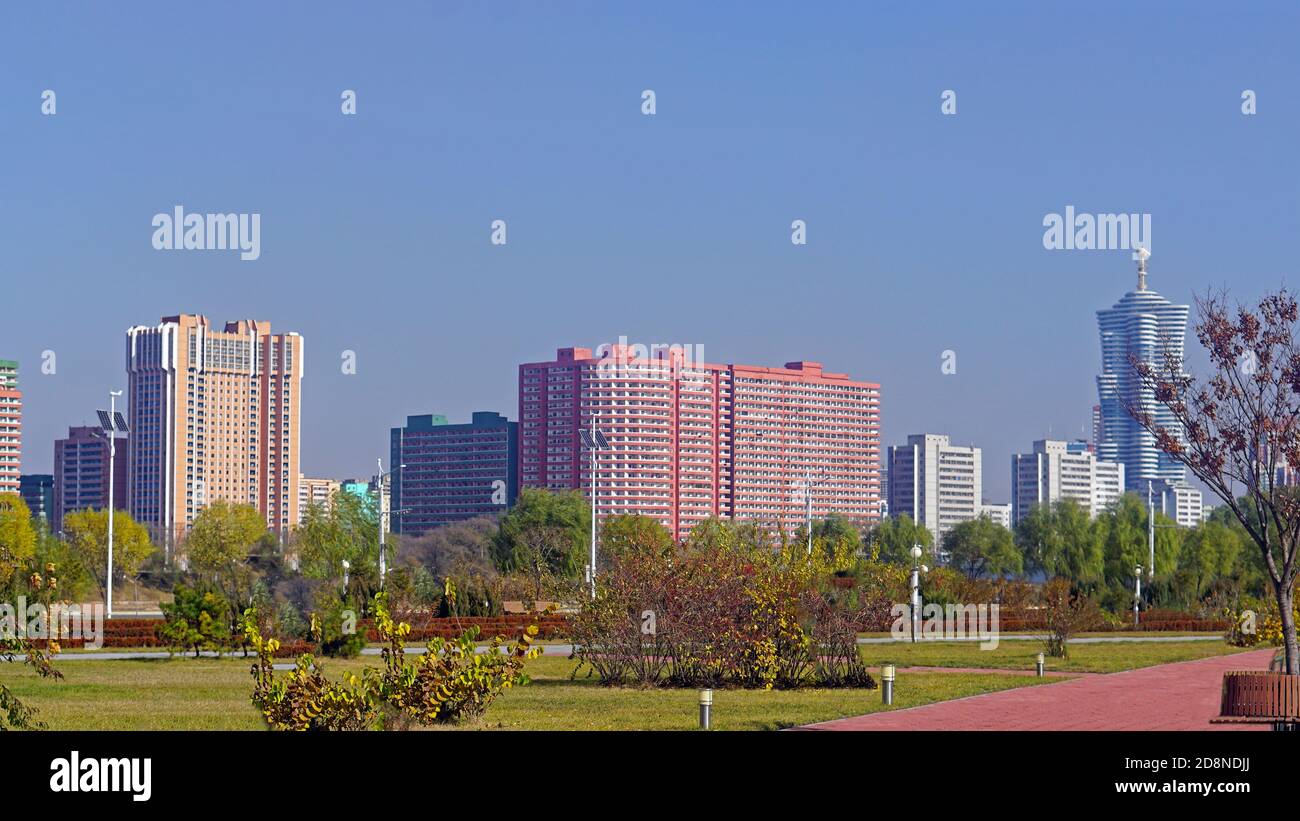 Modern new residential buildings and park in captial city Pyongyang ...