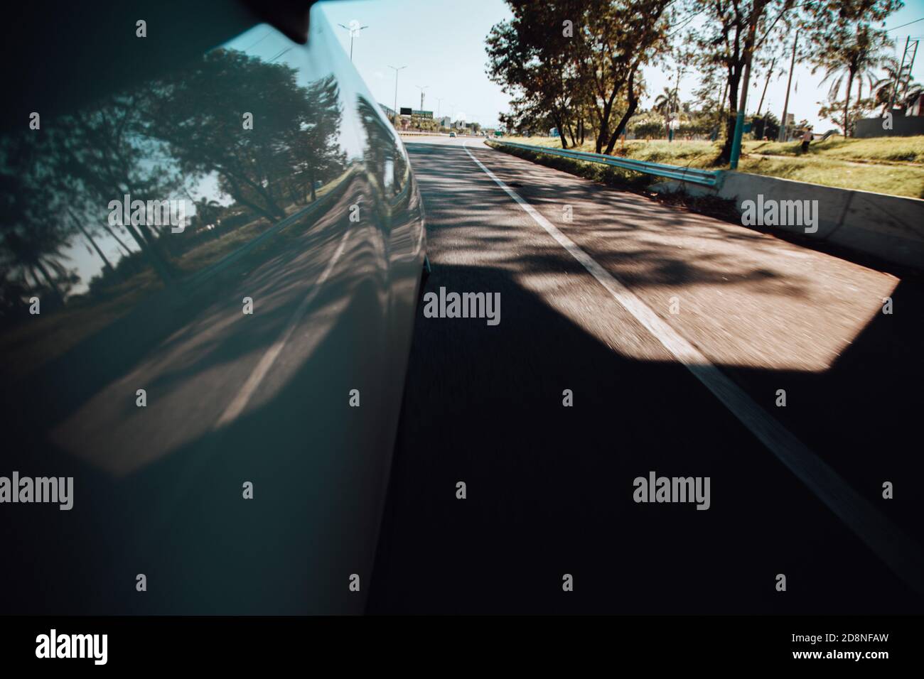 Car rushing along a high-speed road Stock Photo - Alamy