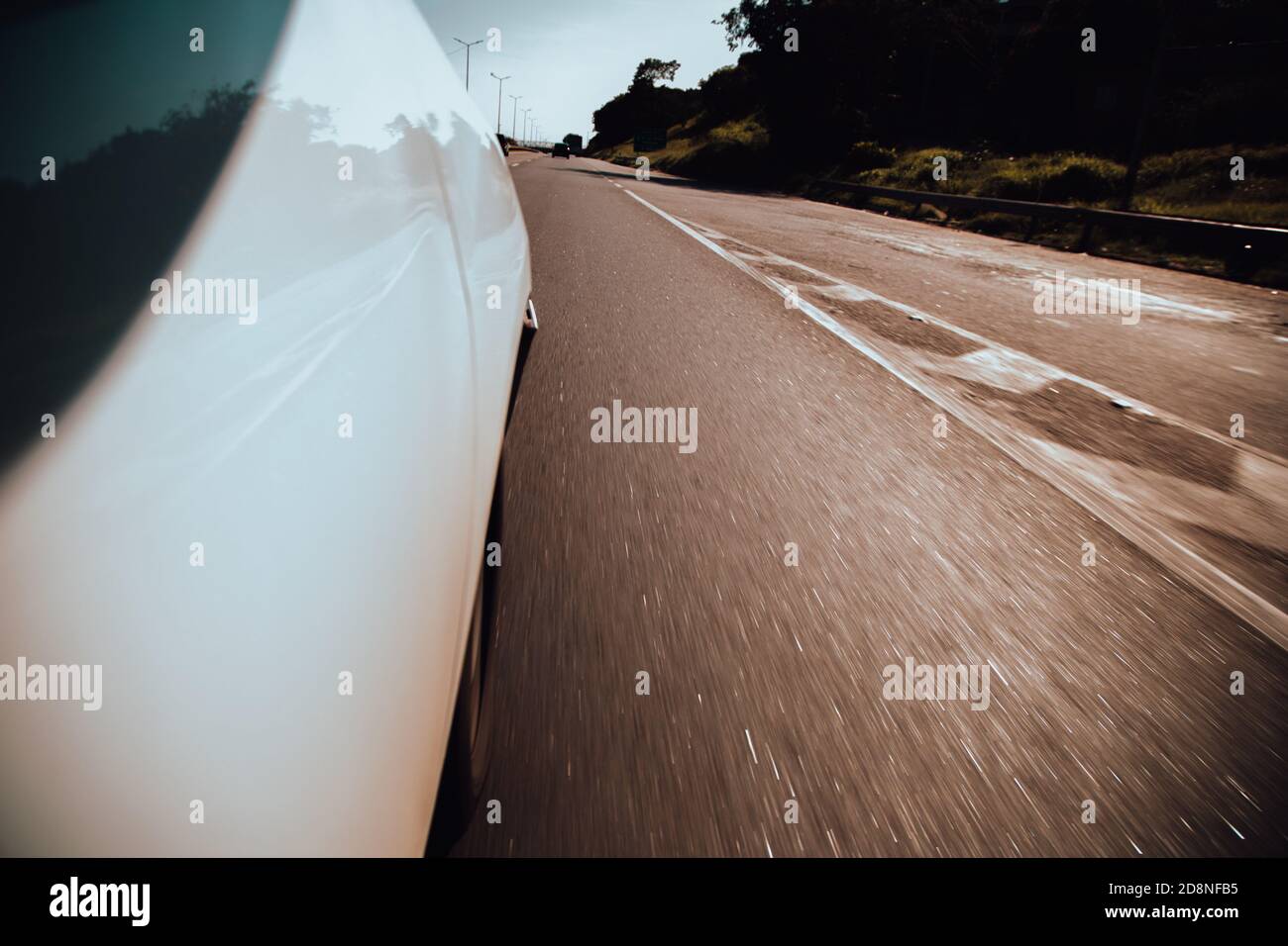 Car rushing along a high-speed road Stock Photo - Alamy
