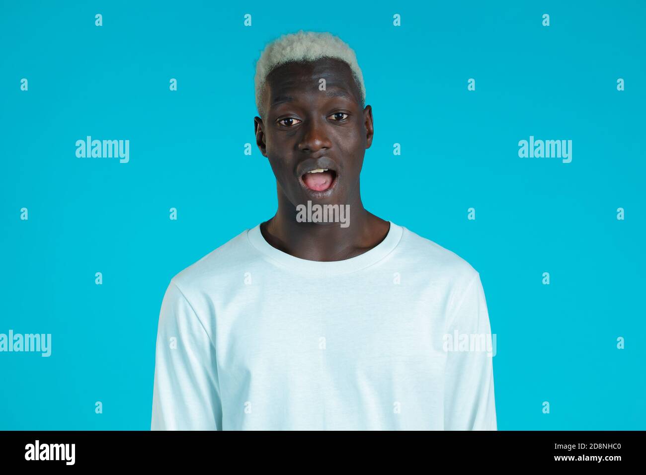 African man depicts amazement, shows WOW delight face effect. Surprised ...