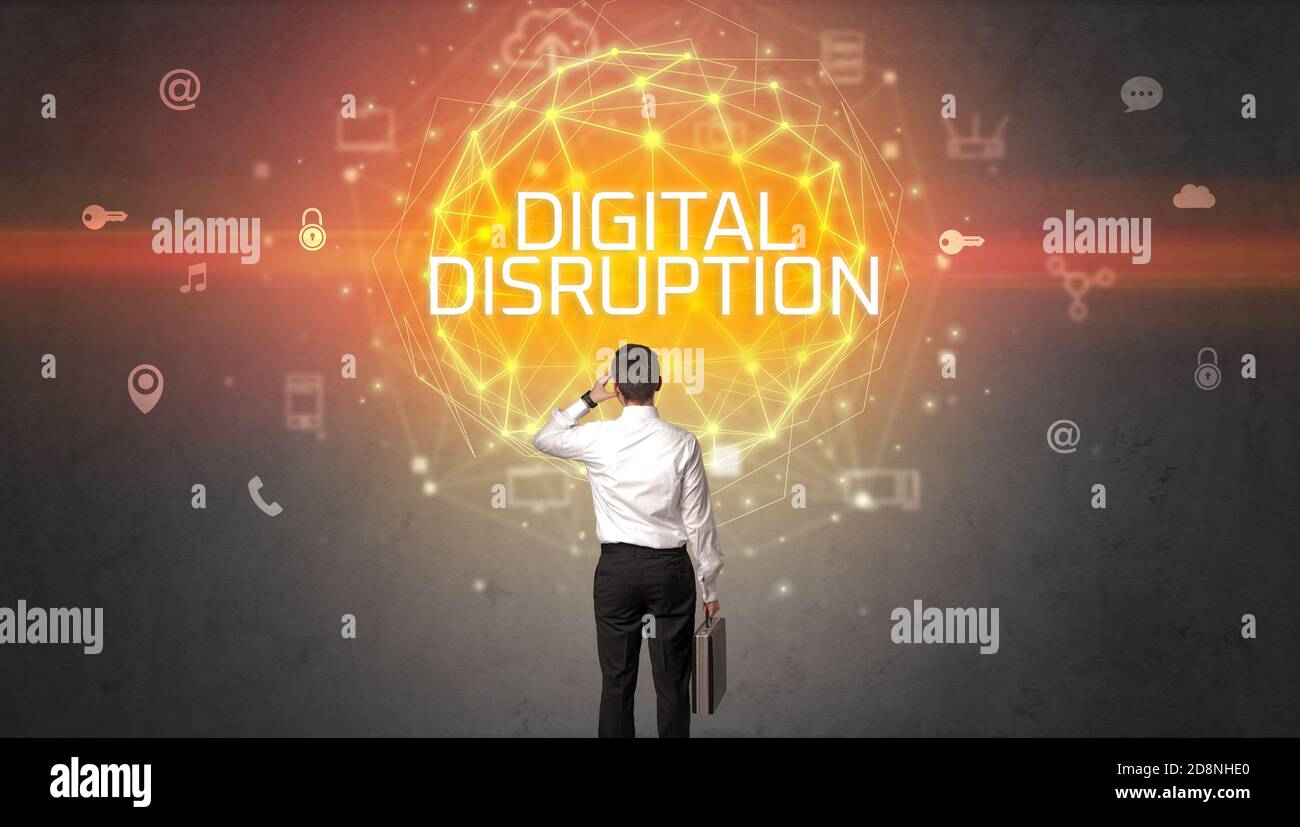 Rear view of a businessman with DIGITAL DISRUPTION inscription, online ...