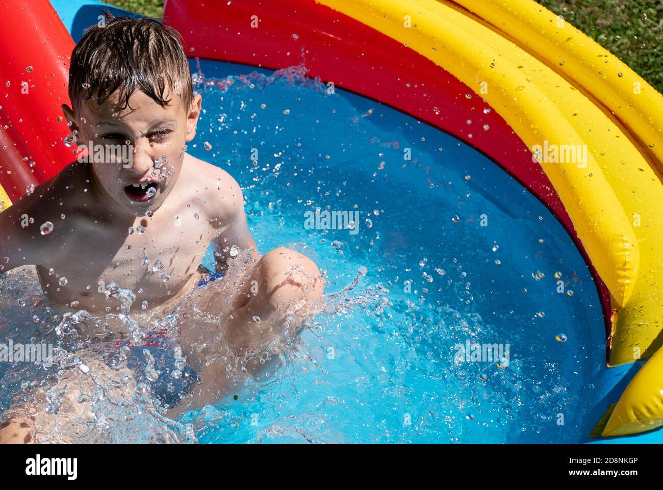 Child jumping to the water hi-res stock photography and images - Alamy