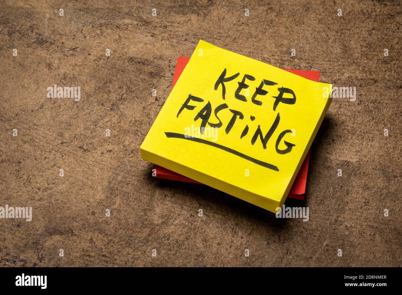 keep fasting reminder note on a brown textured bark paper, healthy ...