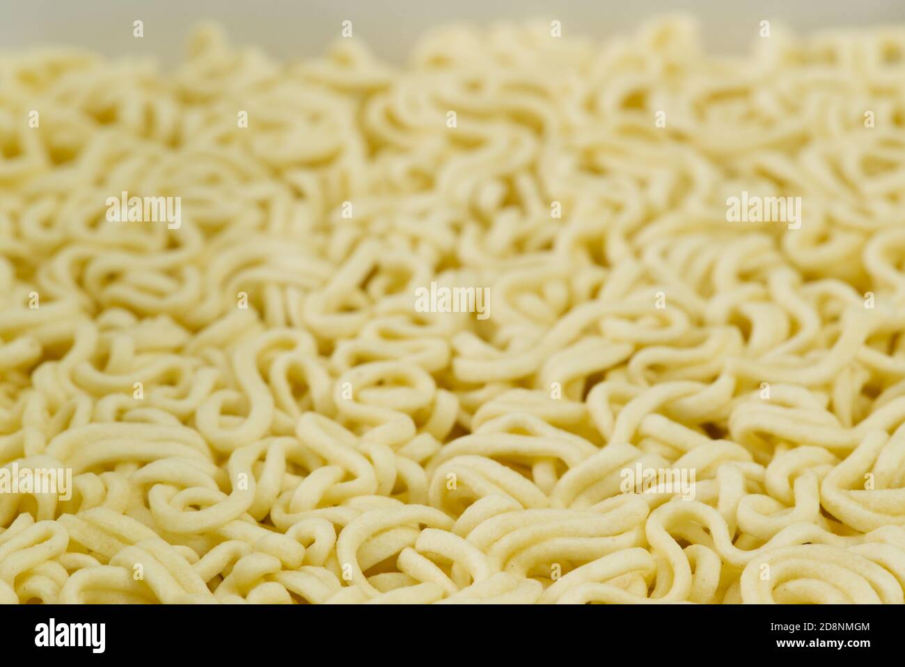 Full frame yellow Instant noodles for background Stock Photo - Alamy