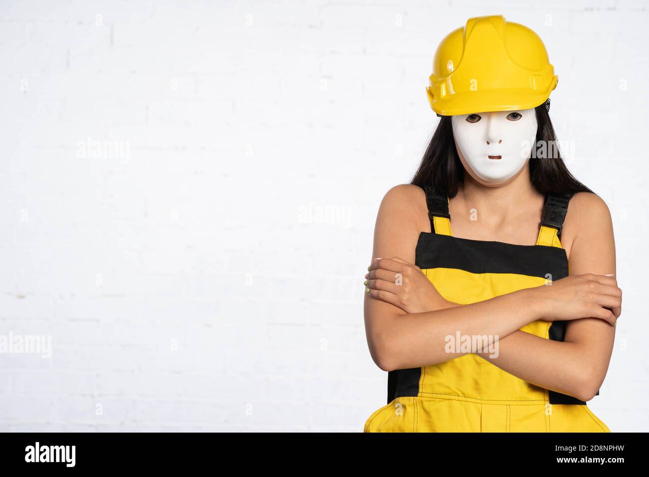 Dissatisfied anonymous worker ready to organize a strike. Hands folded ...
