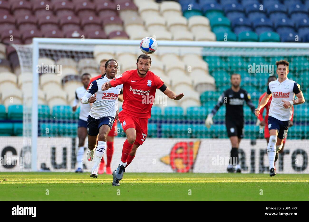Ivan Sunjic (34) of Birmingham City heads the ball away from danger ...