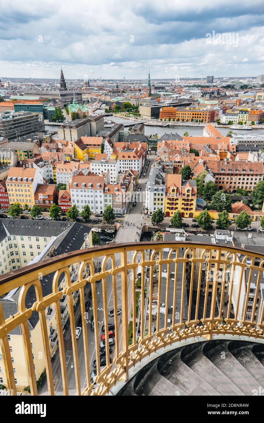 View of the colourful buildings and roofs from the stairs of the tower ...